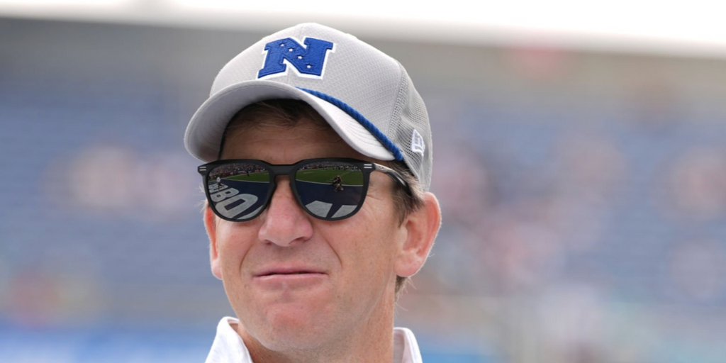 Retired American football quarterback Eli Mannign was seen wearing ...